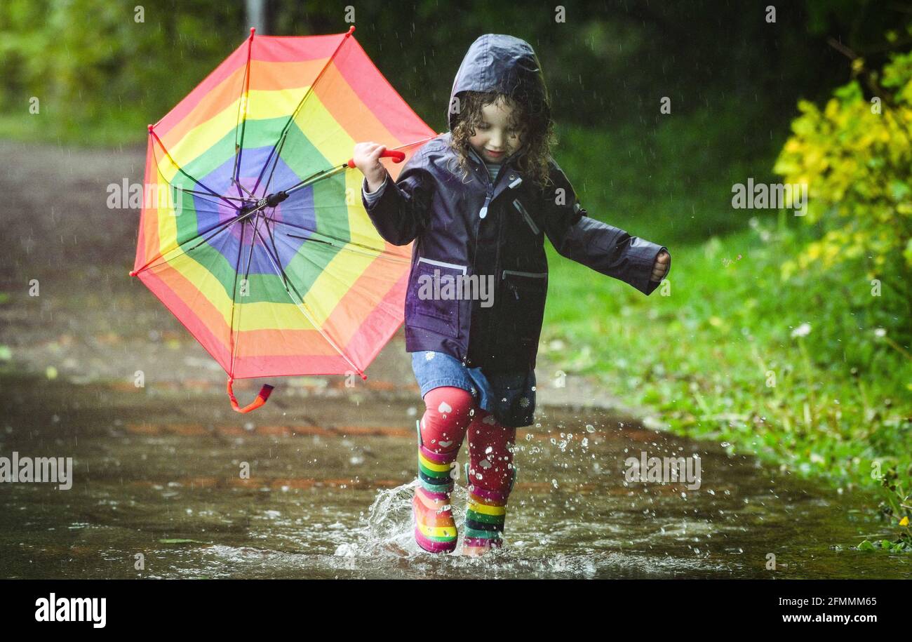 Toddler, Lillian Joy aged four pictured enjoying the wet weather in ...
