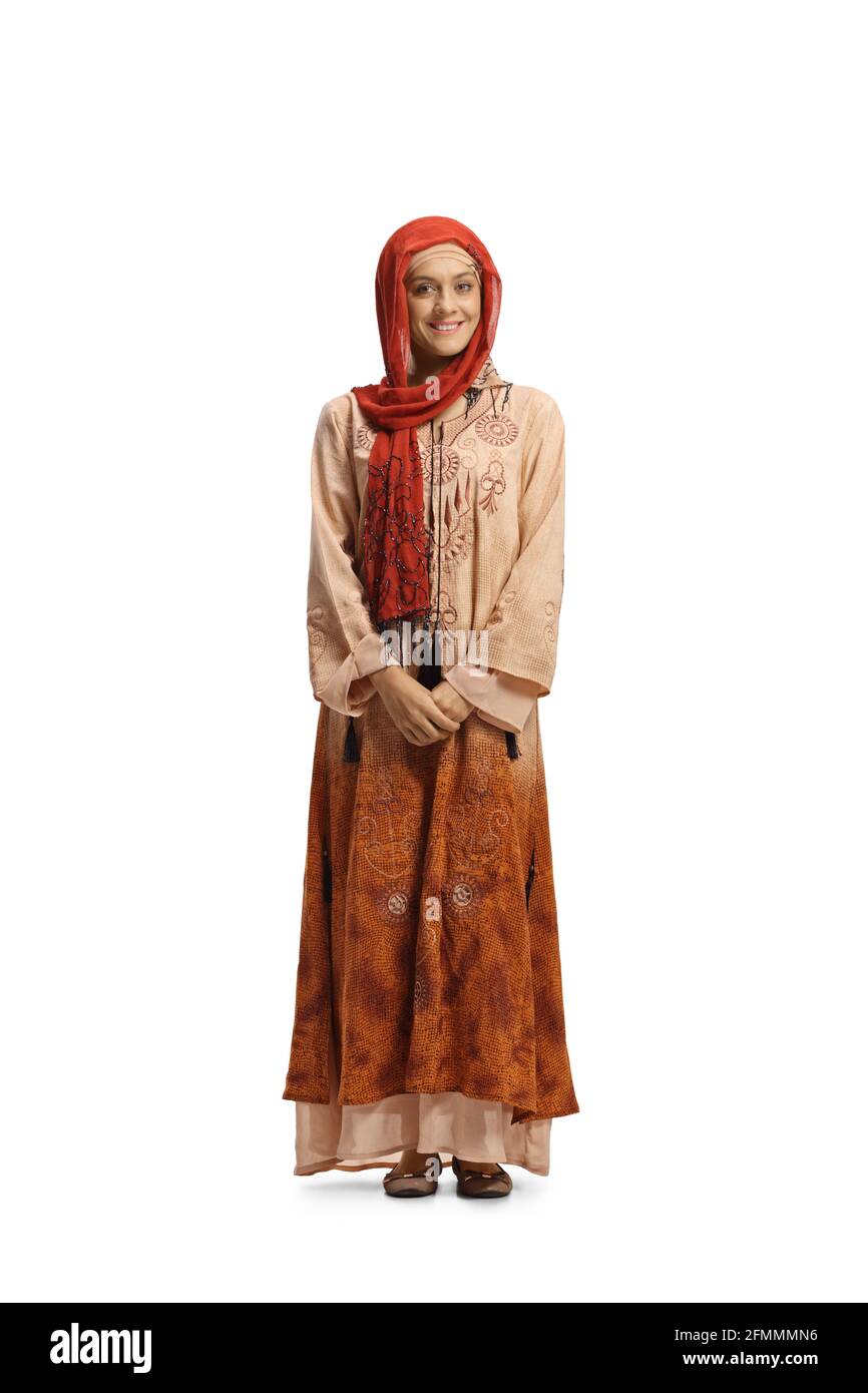 Full length portrait of a young muslim woman in traditional clothes ...