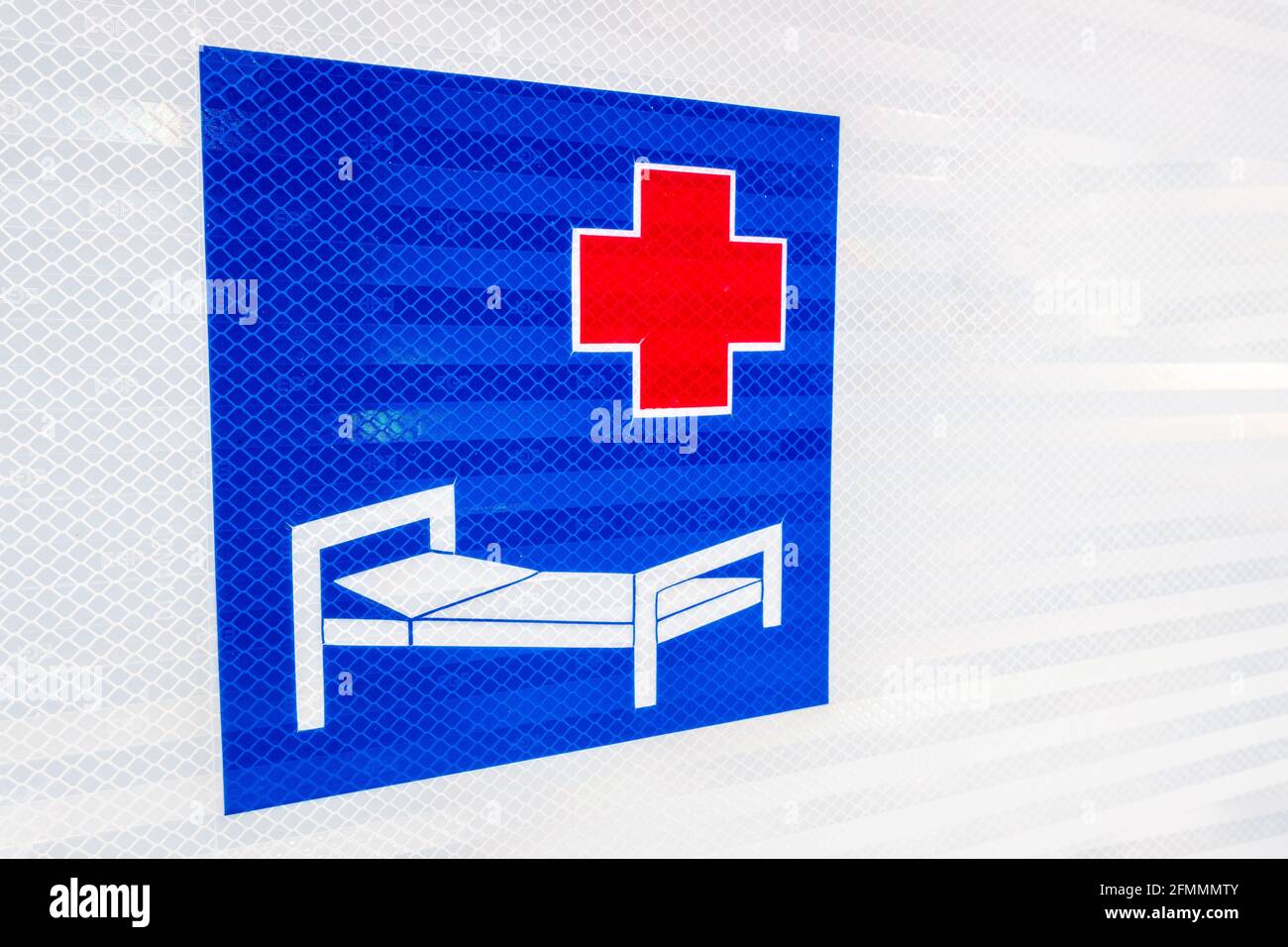 Road sign indicating the direction of a hospital Stock Photo - Alamy