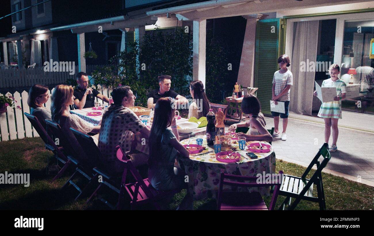 BAD TALES, (aka FAVOLACCE), Elio Germano (left, arm up), Aldo Ottobrino ...