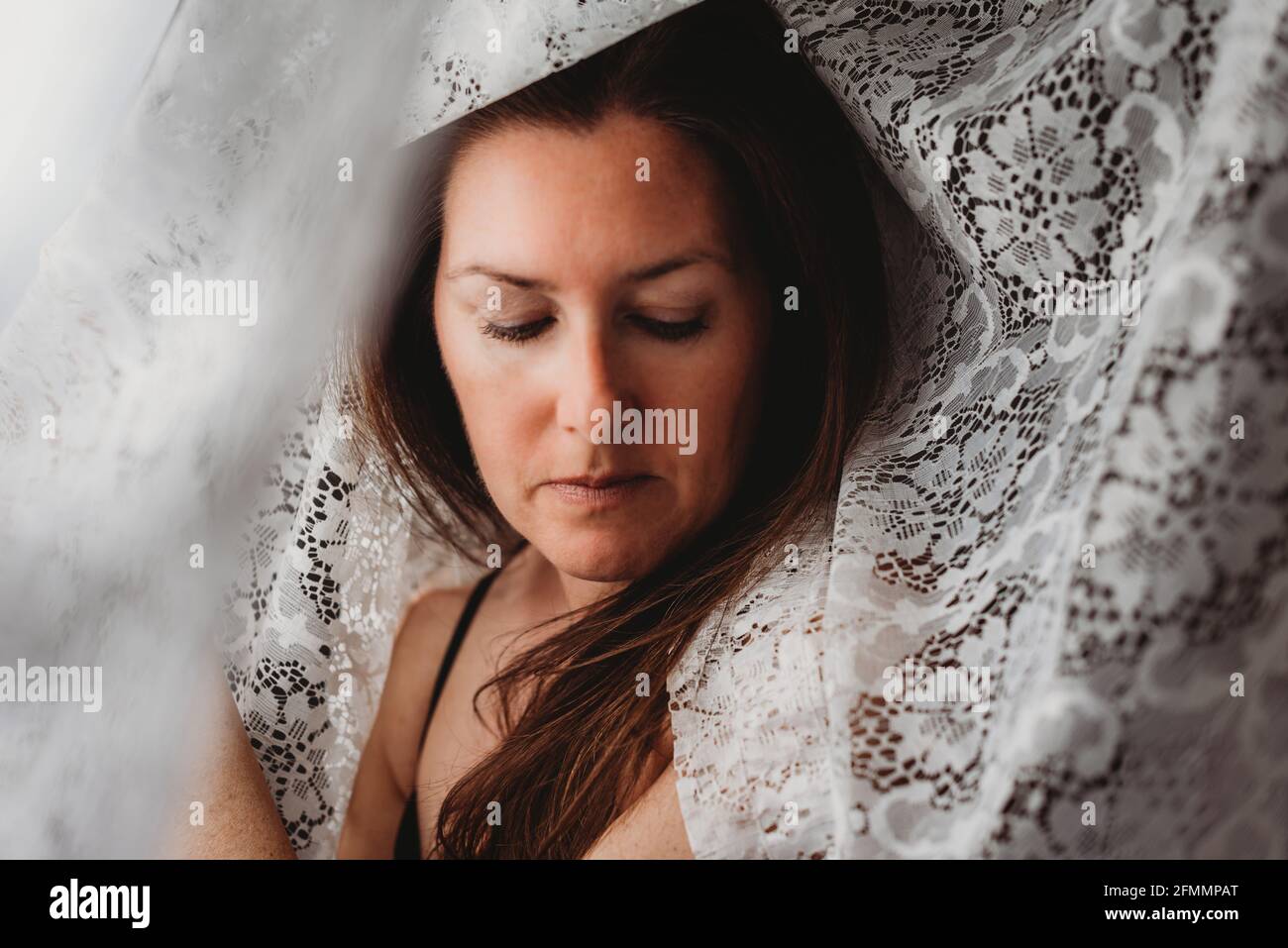 Beautiful woman hidden face black hi-res stock photography and images ...