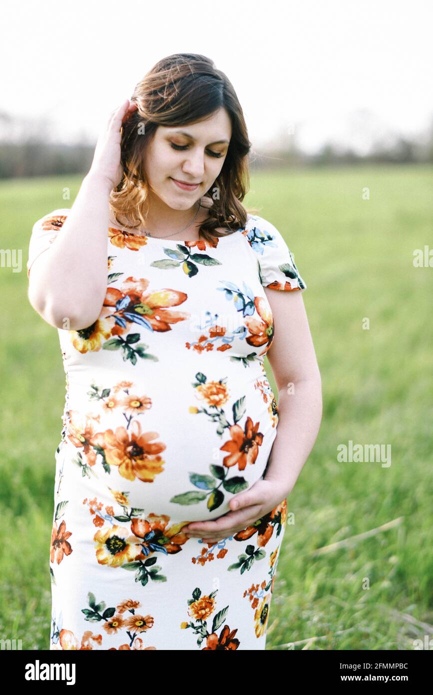 Facial expression pregnancy bump hi-res stock photography and images ...