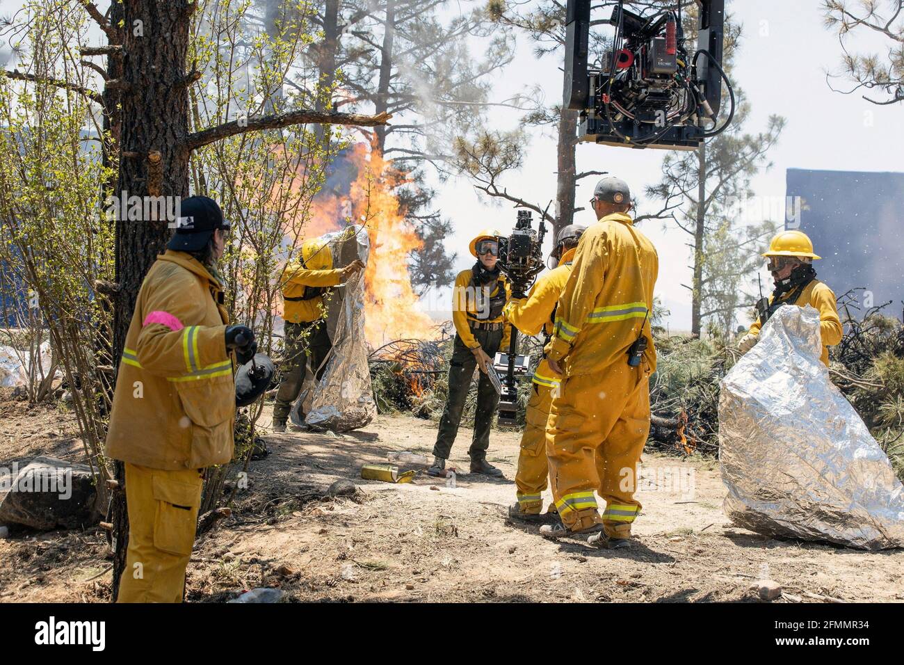 THOSE WHO WISH ME DEAD, center: Angelina Jolie, on set, 2021. ph ...