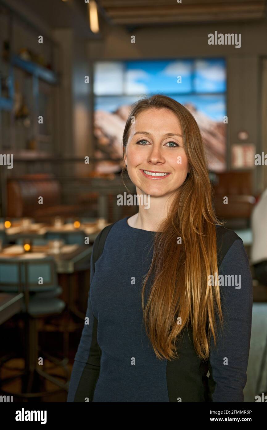 confident restaurant owner at her hipster bar in Reykjavik Stock Photo ...