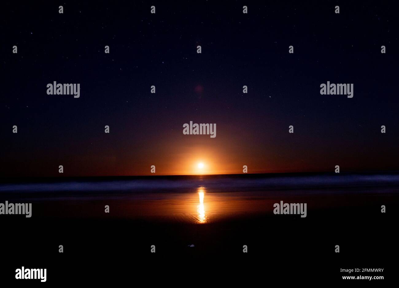 Sunrise/Moonrise Over the Ocean on the Gold Coast Stock Photo - Alamy