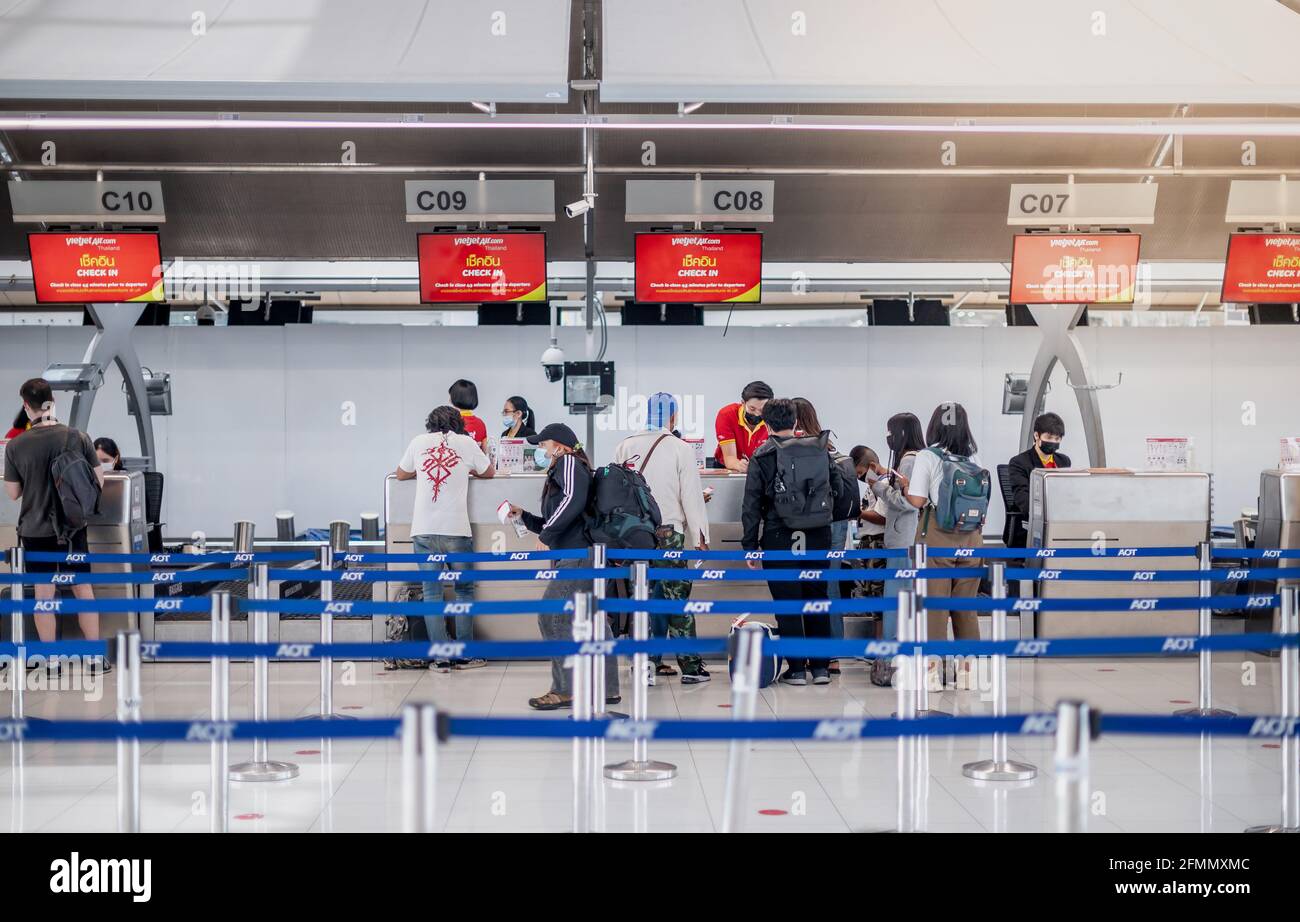 BANGKOK THAILAND APR 14 2021 The group of passenger preparing to check ...