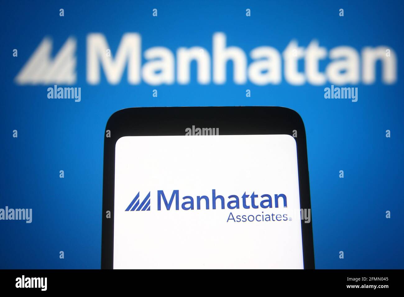In this photo illustration the Manhattan Associates logo is seen on a ...