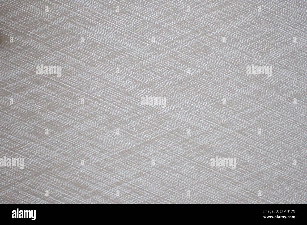 Flat polished surface of silver-colored metal with diagonal grinding ...