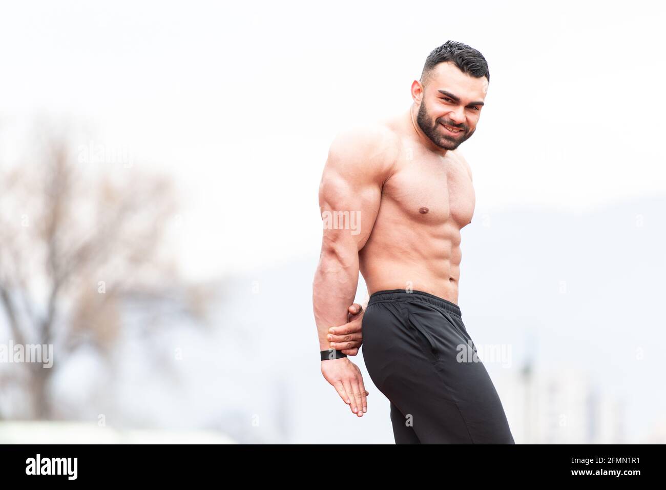 Handsome Beard Man Standing Strong and Posing at Outdoors Stock Photo ...