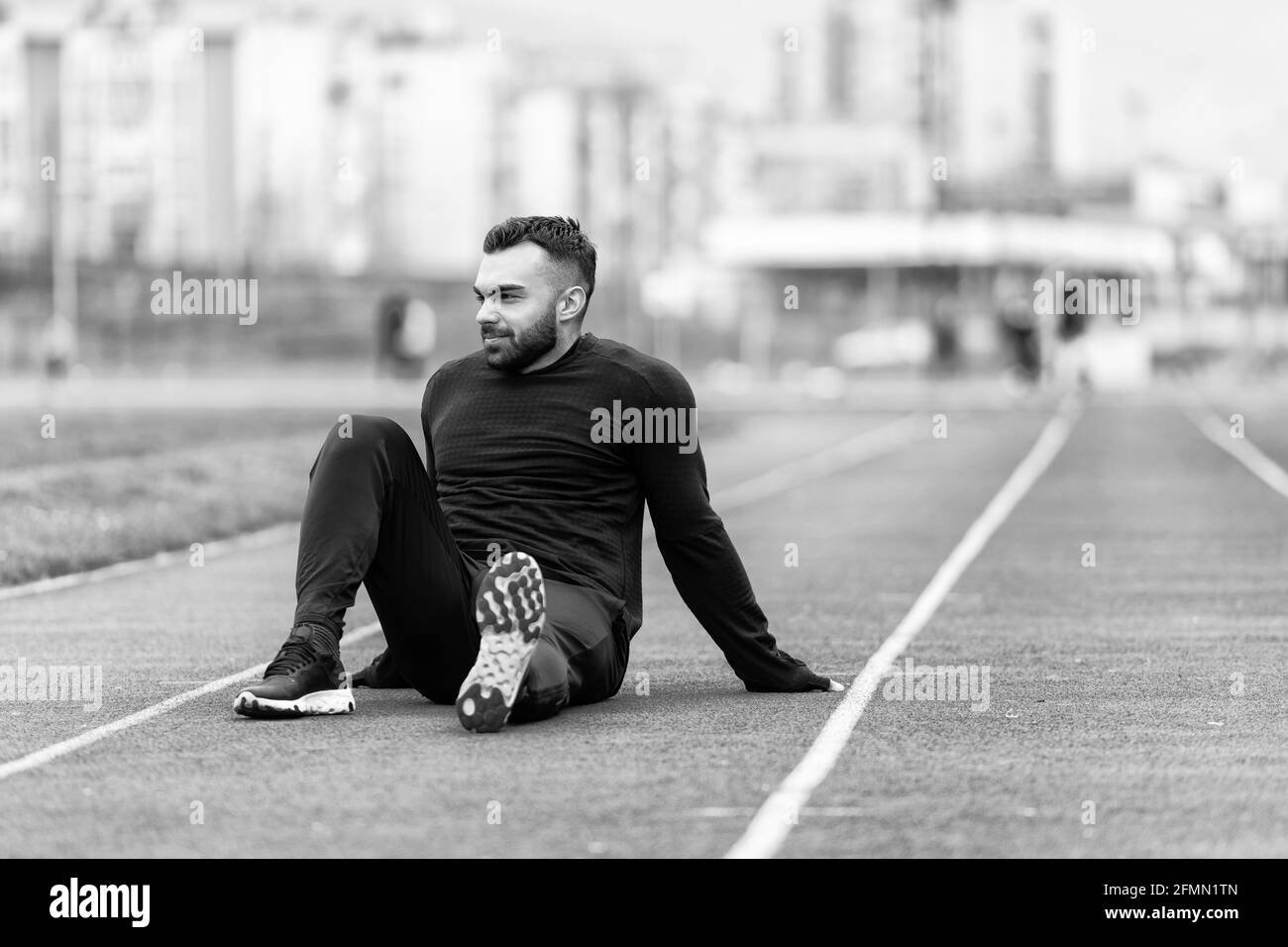 Man Stretching Legs Breaking Relax After Running Tired - Rest Training ...