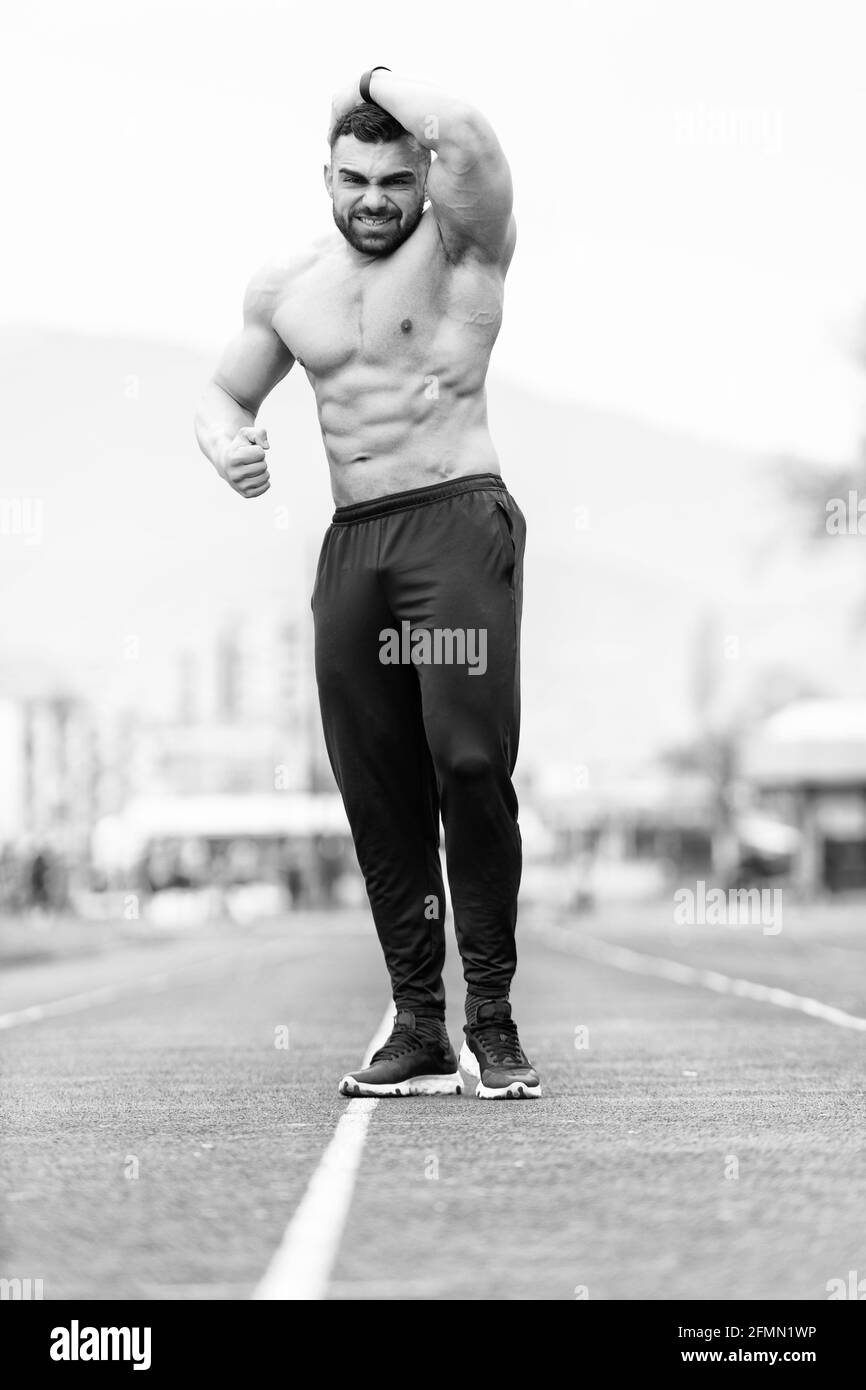 Handsome Beard Man Standing Strong and Posing at Outdoors Stock Photo ...
