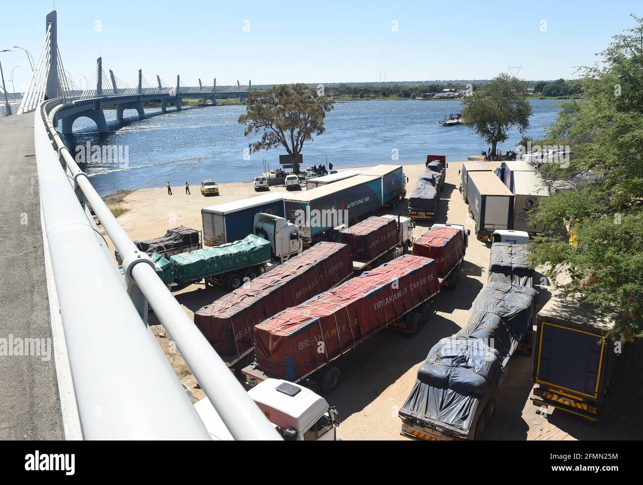 Gaborone. 10th May, 2021. Trucks wait at the Kazungula border between ...