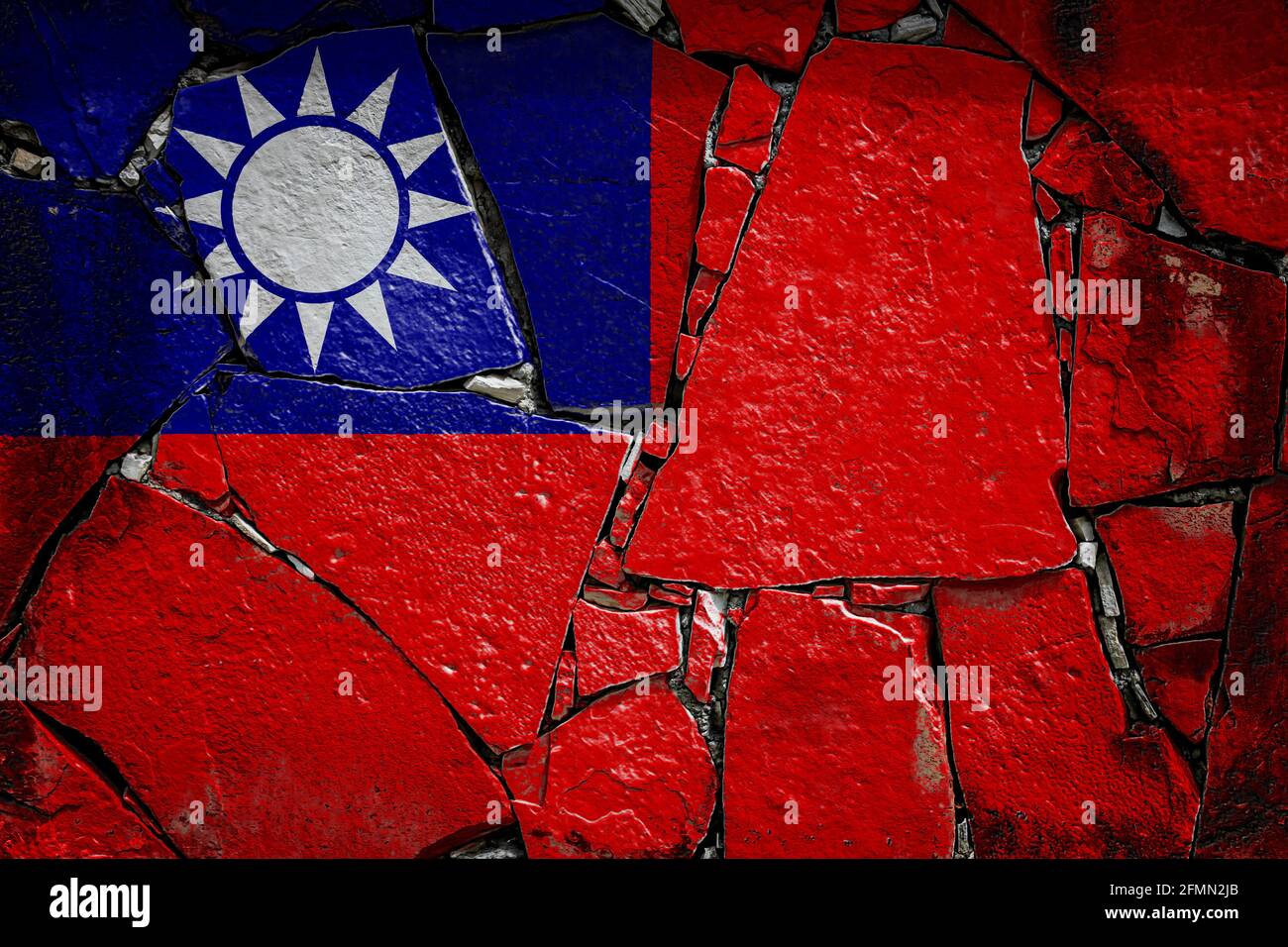National flag of Taiwan depicting in paint colors on an old stone wall ...