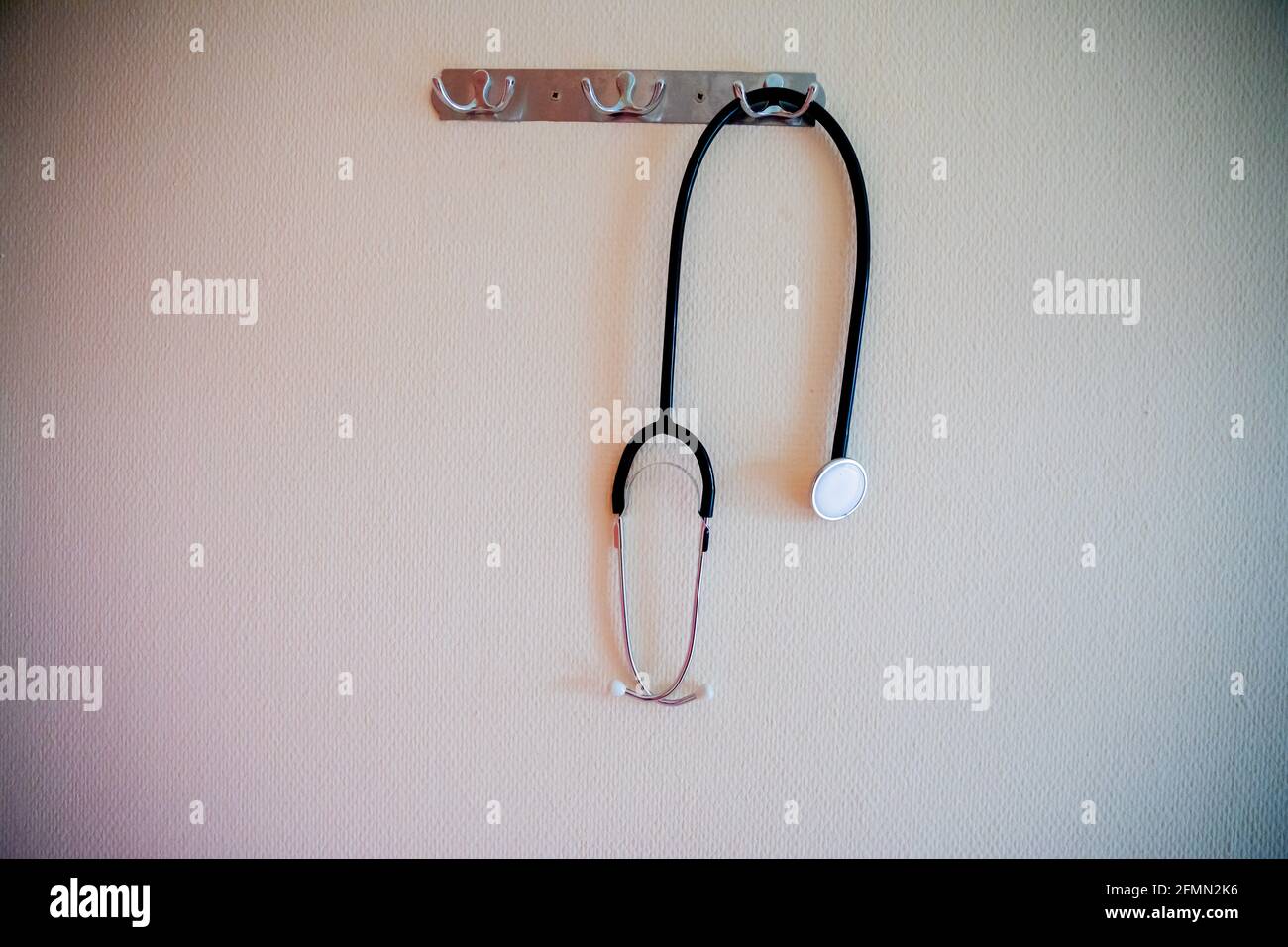Berlin, Germany. 07th May, 2021. A stethoscope hangs on a coat rack in ...