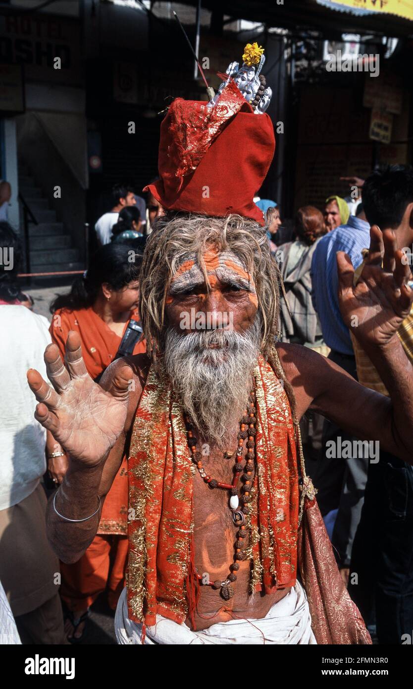 Holy man sadhu hand up hi-res stock photography and images - Alamy