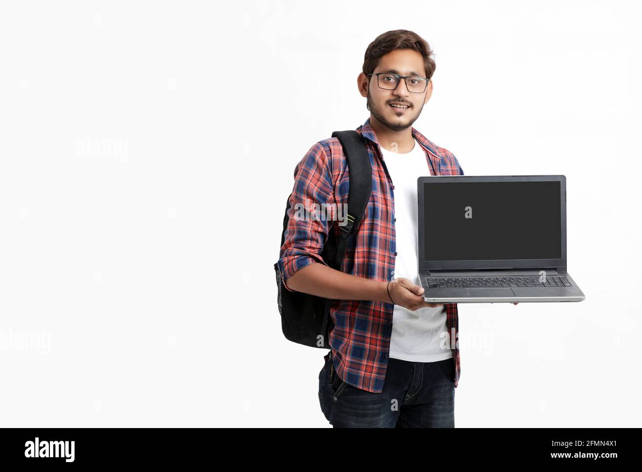 Indian student with laptop Cut Out Stock Images & Pictures - Alamy