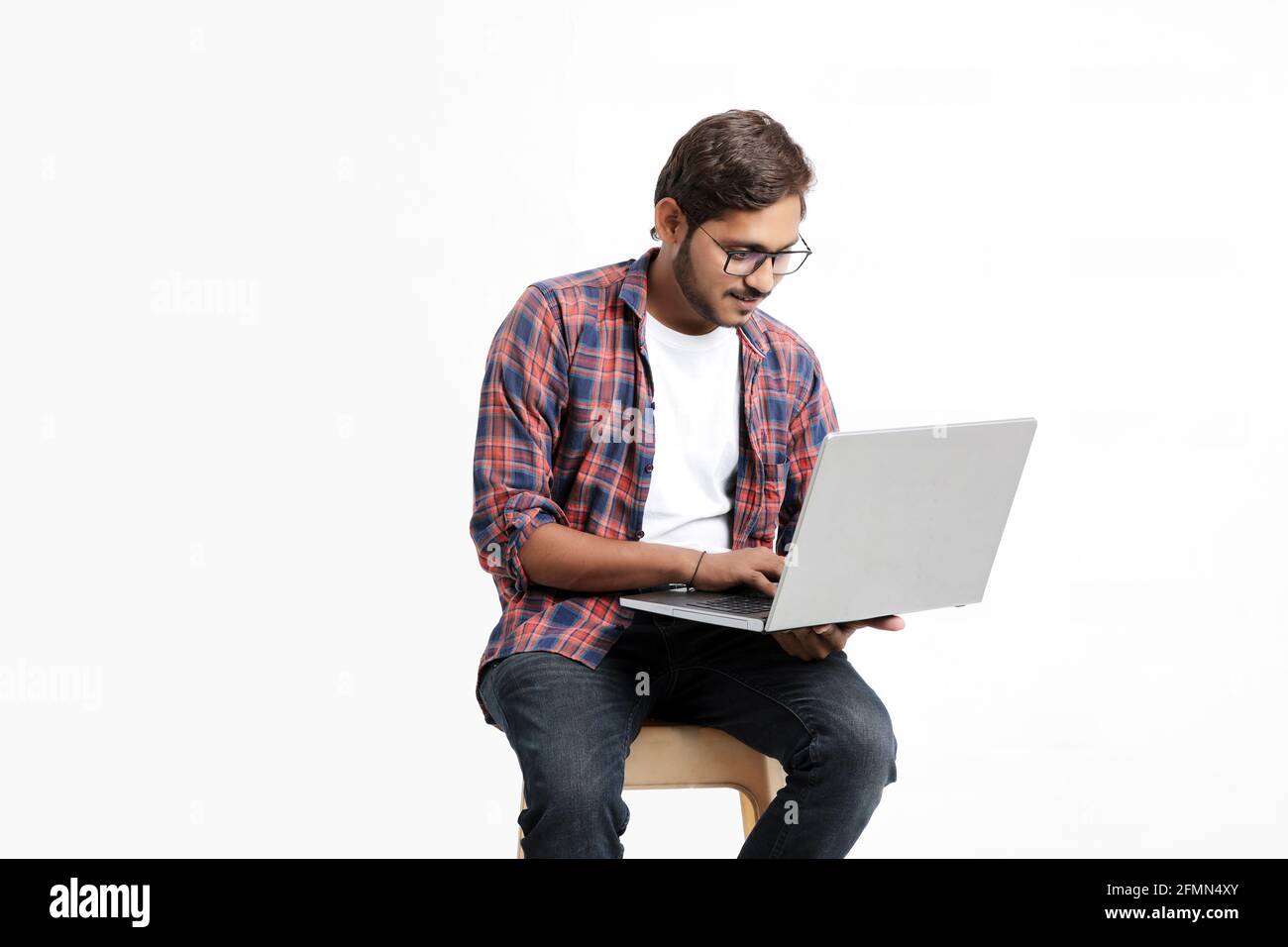 Teen student studying on computer Cut Out Stock Images & Pictures - Alamy