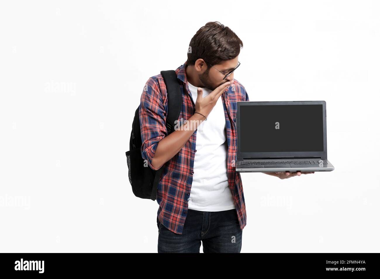 Indian college student showing laptop screen on white background Stock ...