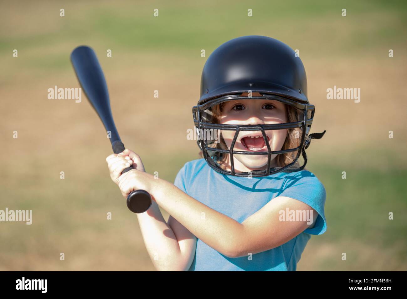 Little boy posing with a baseball bat. Portrait of kid playing baseball ...