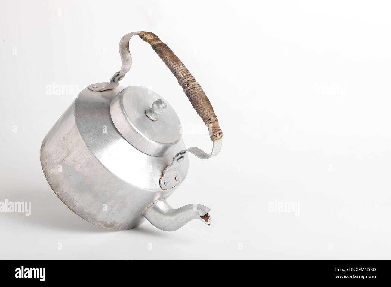 Aluminum tea kettle or tea pot on white background Stock Photo - Alamy