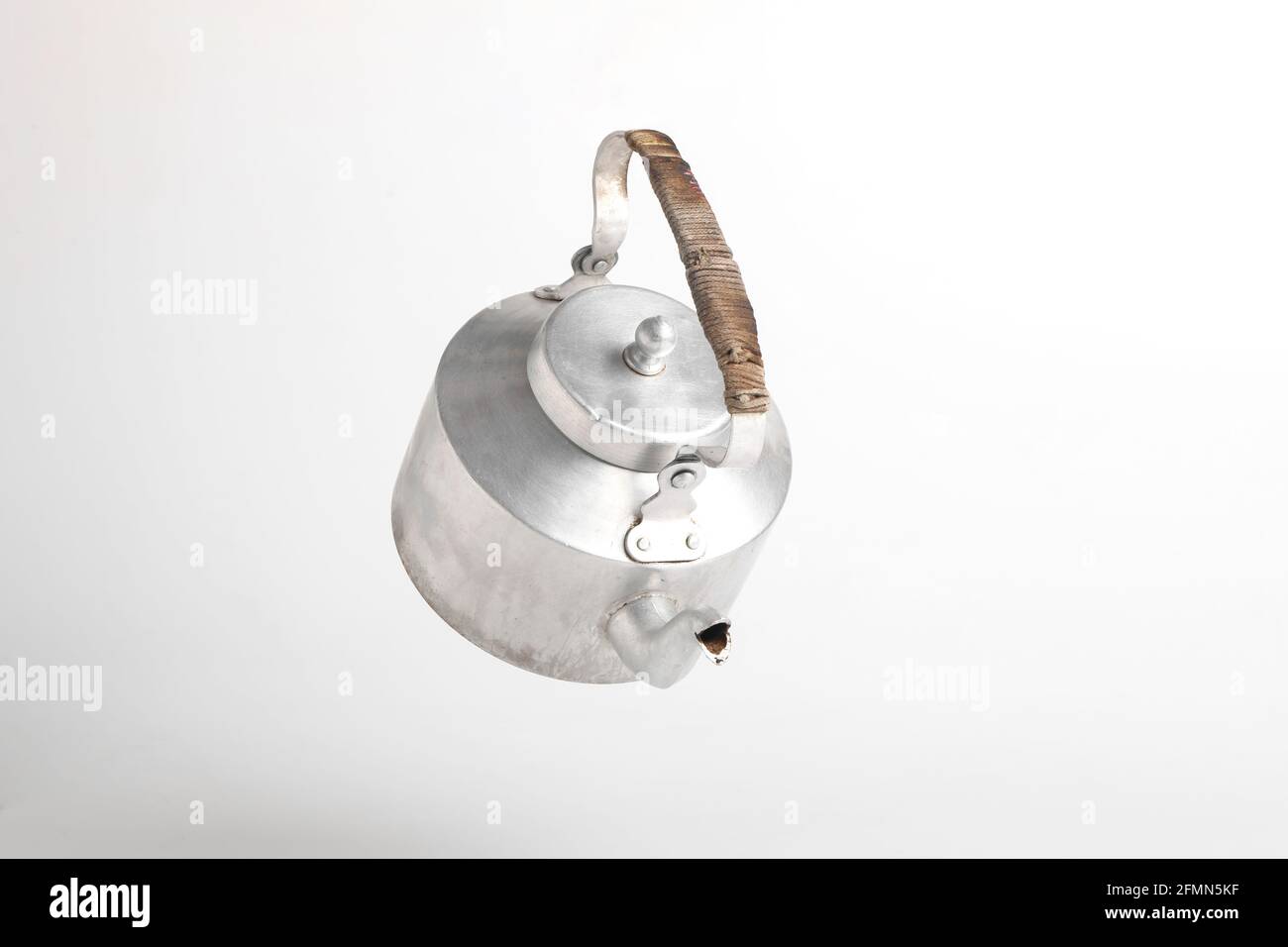 Aluminum tea kettle or tea pot on white background Stock Photo - Alamy