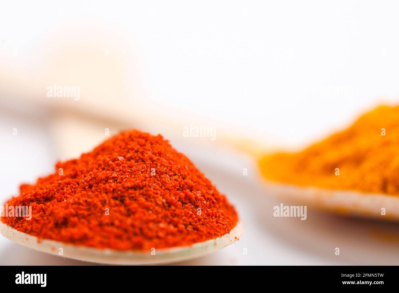 White pepper and chili powder in spoon hi-res stock photography and ...