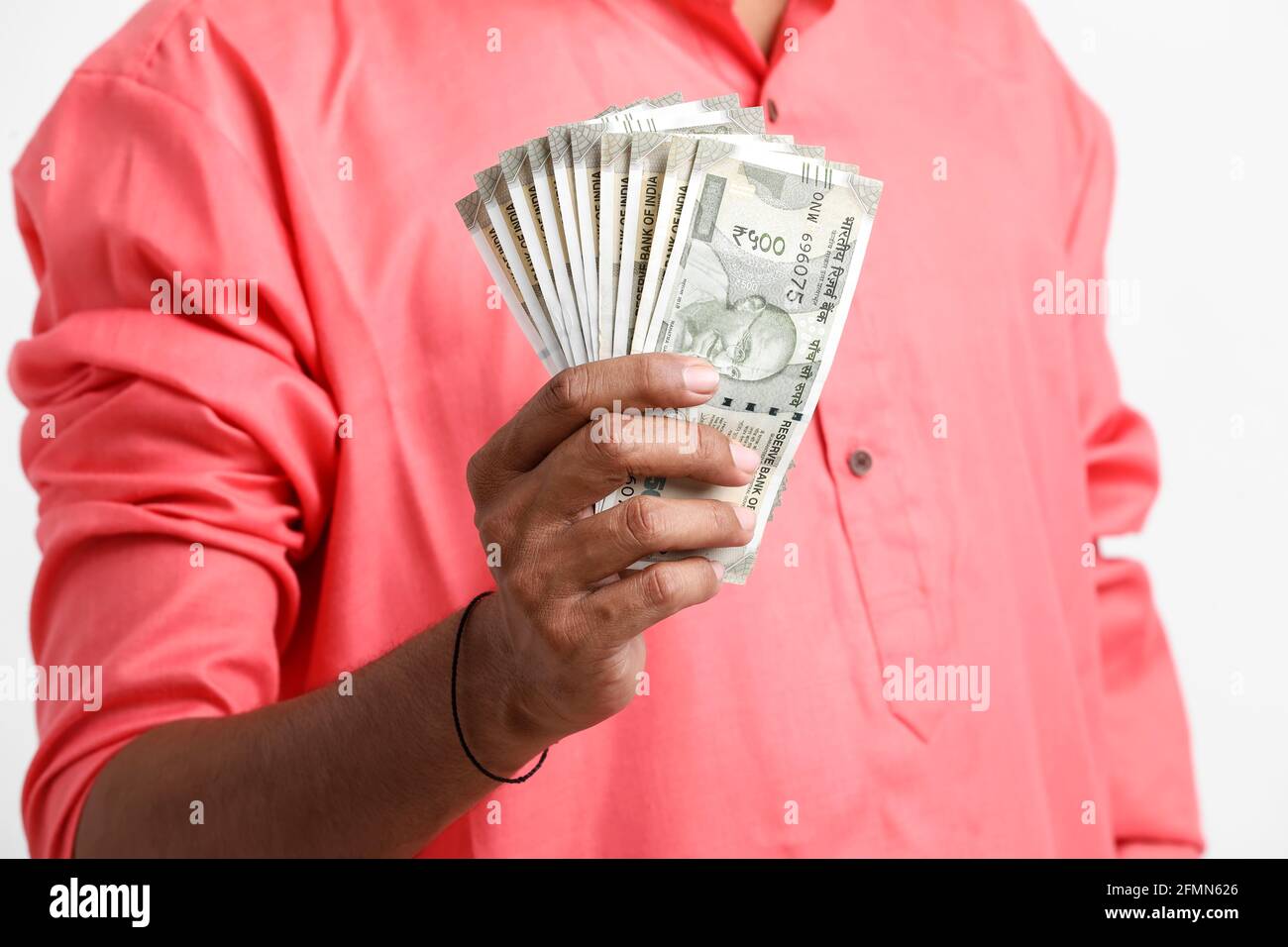 Indian man counting newly launched indian five hundred rupees. Money ...