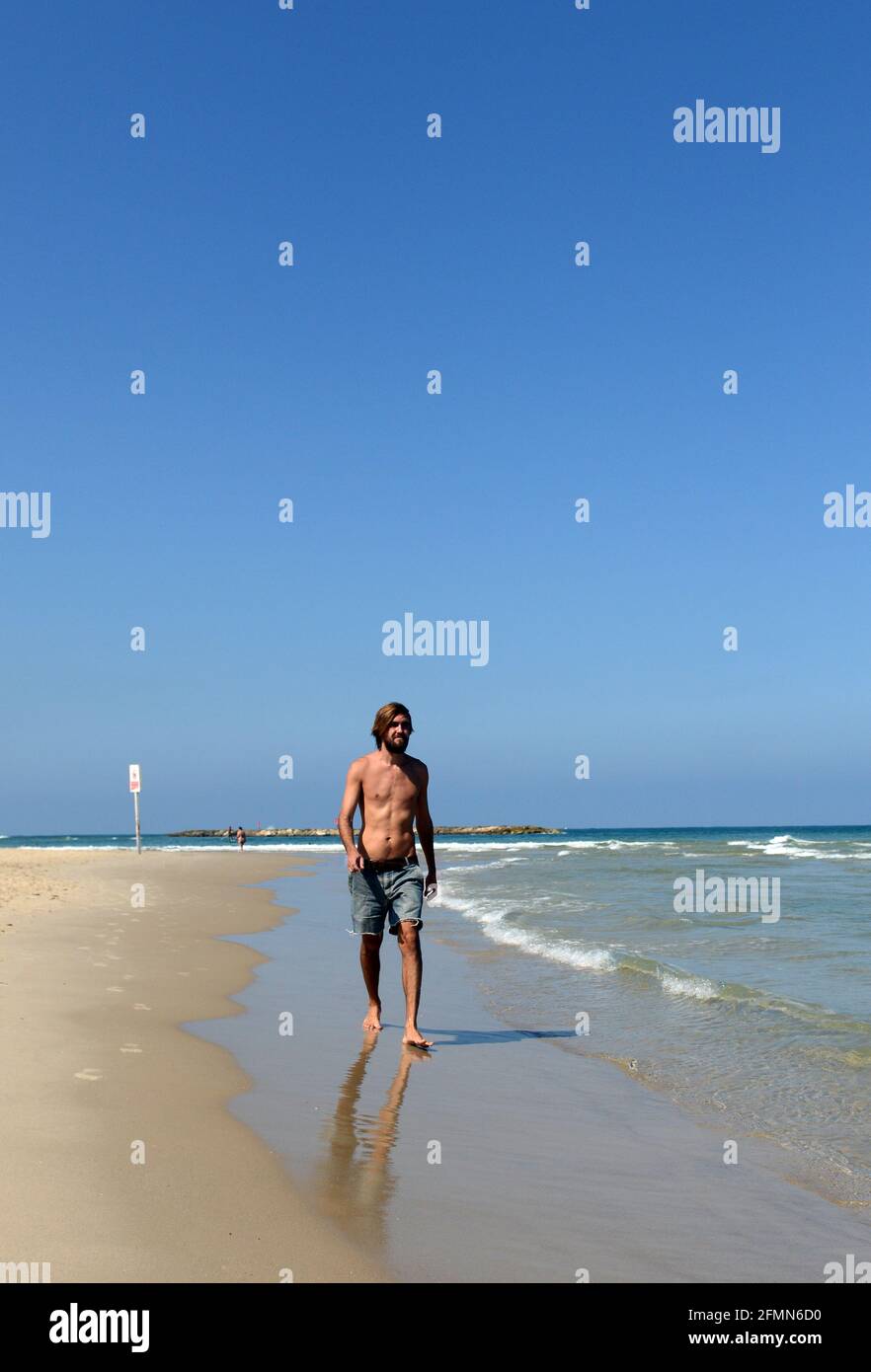 Good Looking Man On Beach