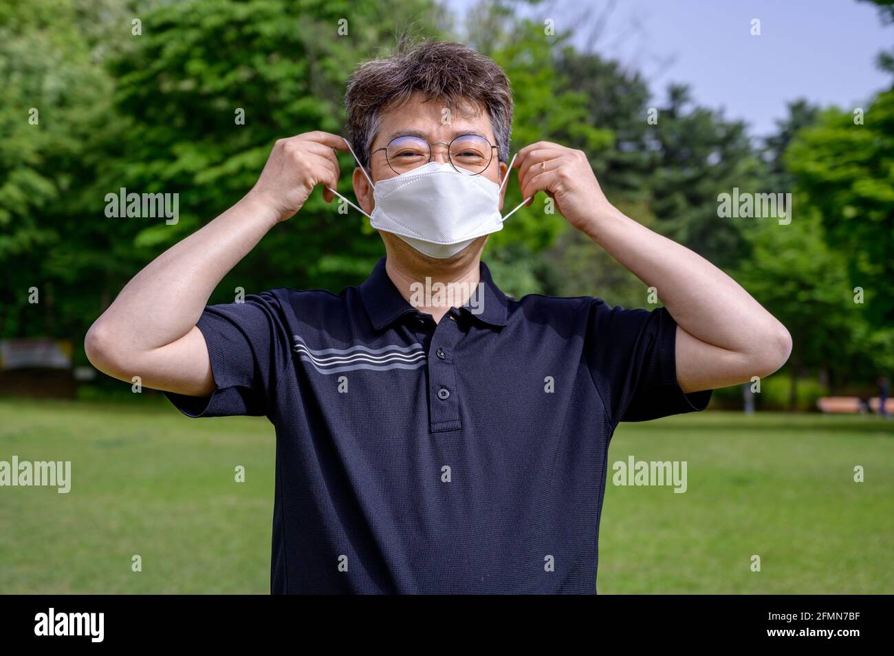 Senior asian man face mask hi-res stock photography and images - Alamy