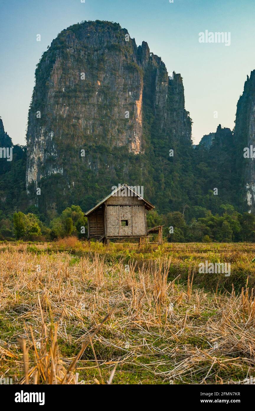 A wooden hut in the limestone karst scenery in the countryside around ...