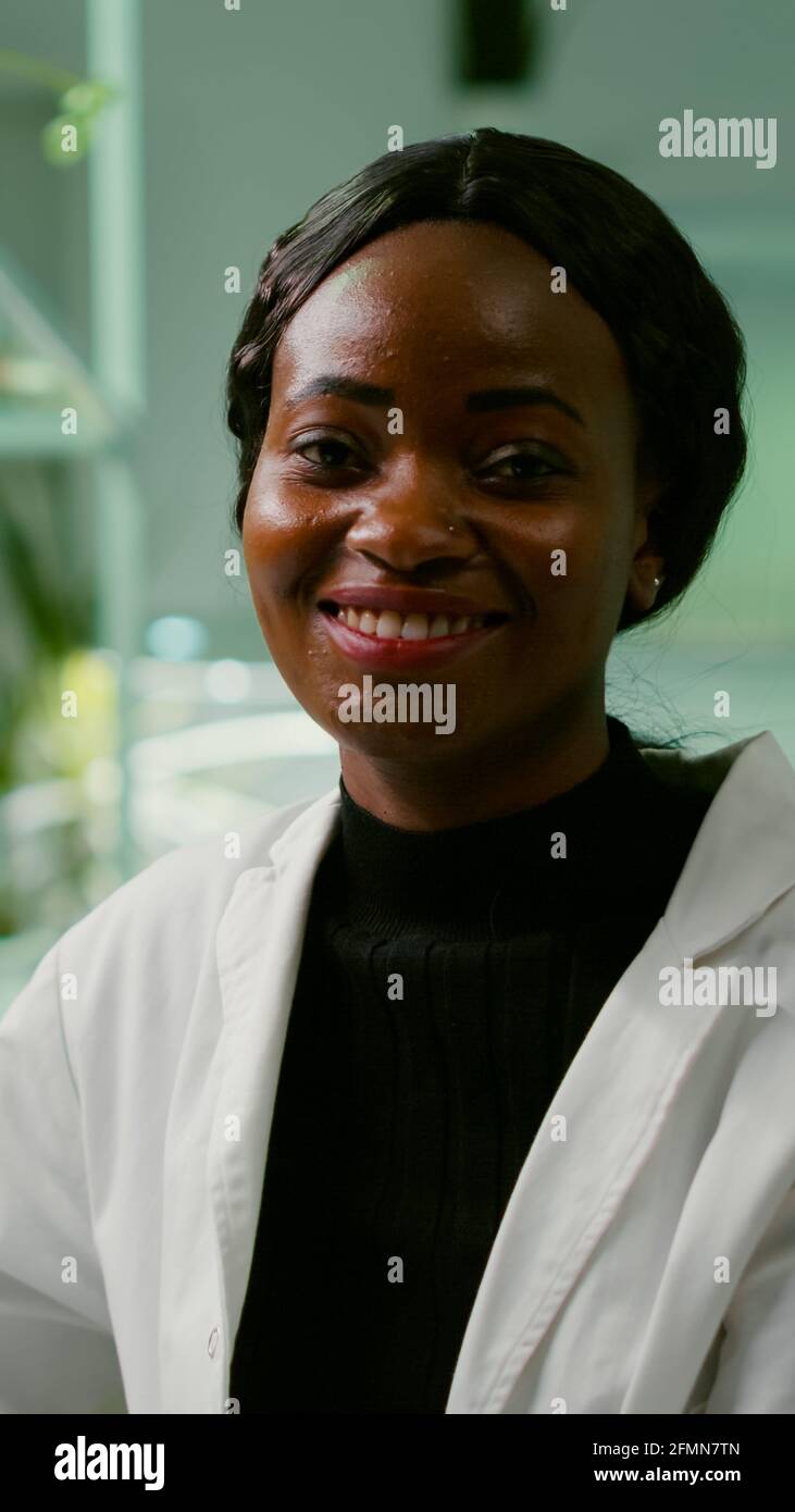 Woman standing looking dna hi-res stock photography and images - Alamy