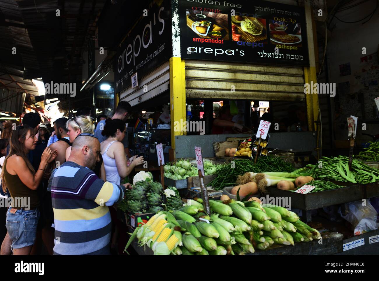A Venezuelan arepa street food bar at the Carmel market in Tel-Aviv ...