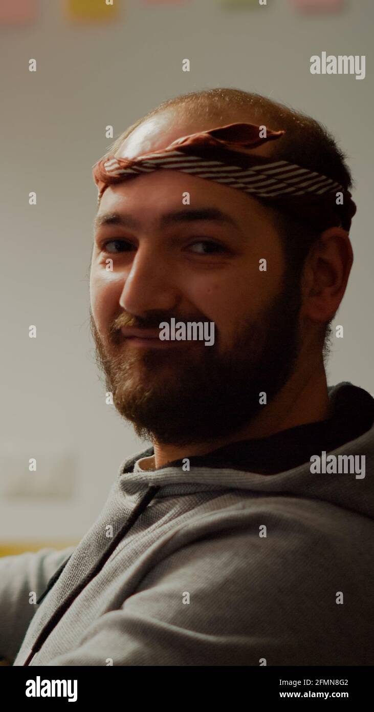 Portrait of young pro gamer man sitting at powerful personal computer ...