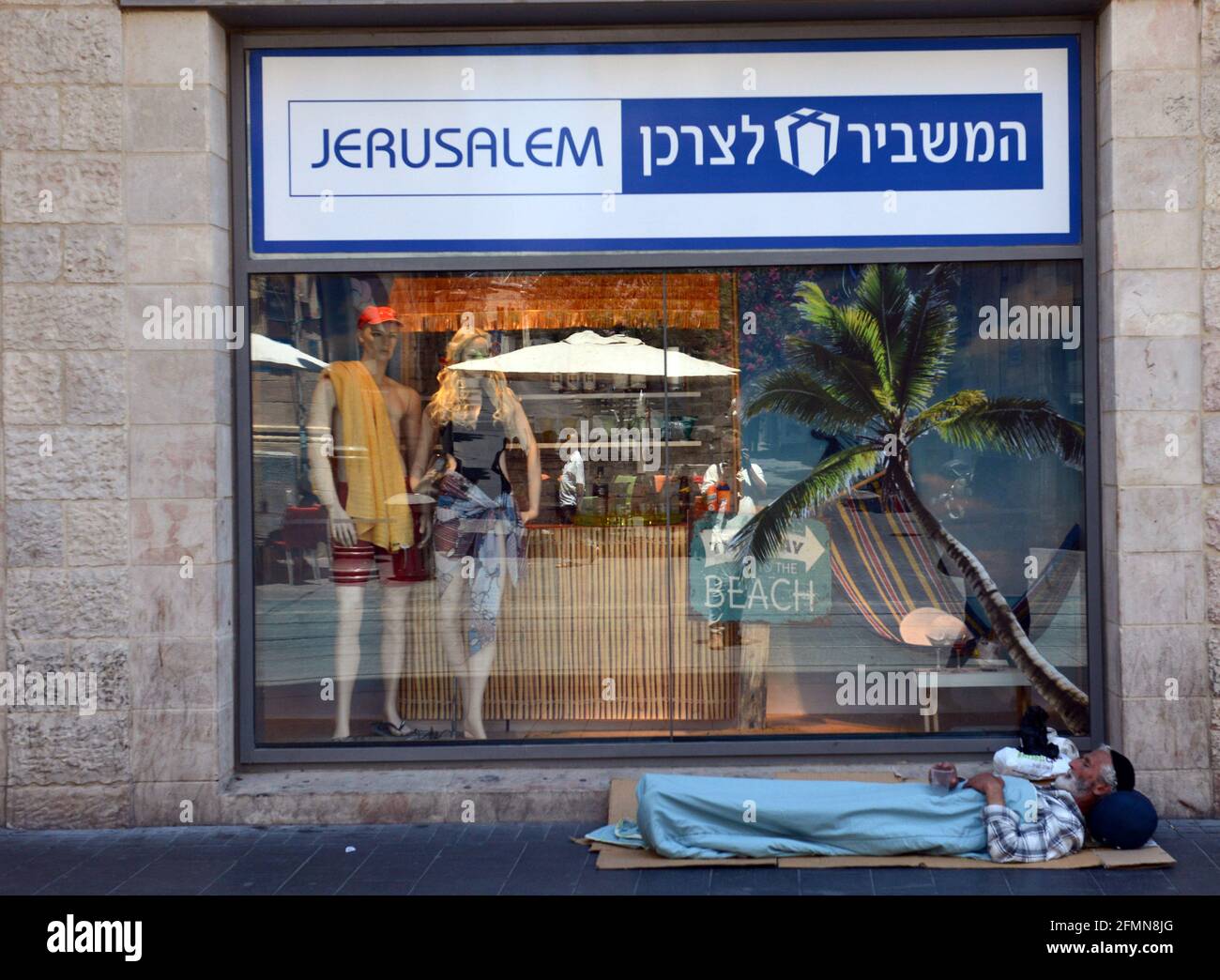 A homeless man sleeping on Jaffa street in Jerusalem, Israel Stock ...