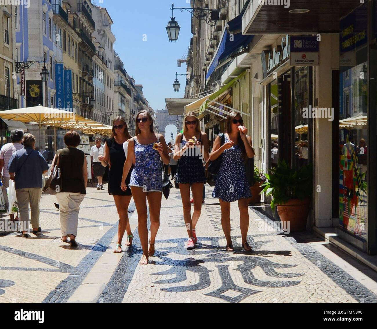 Tourist walking on Rua Augusta Street in the center of Lisbon Stock ...
