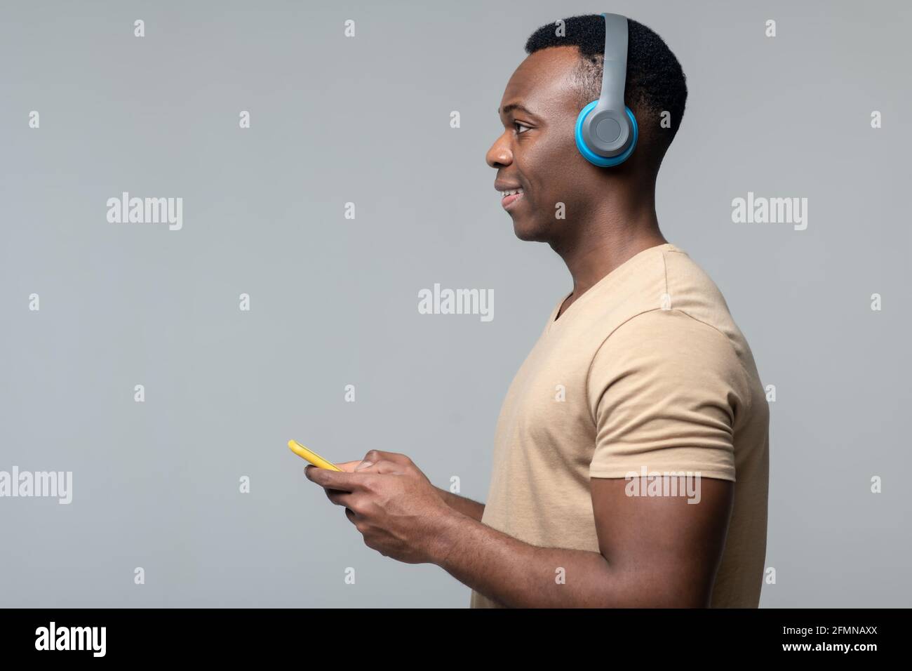 African american man standing sideways hi-res stock photography and ...