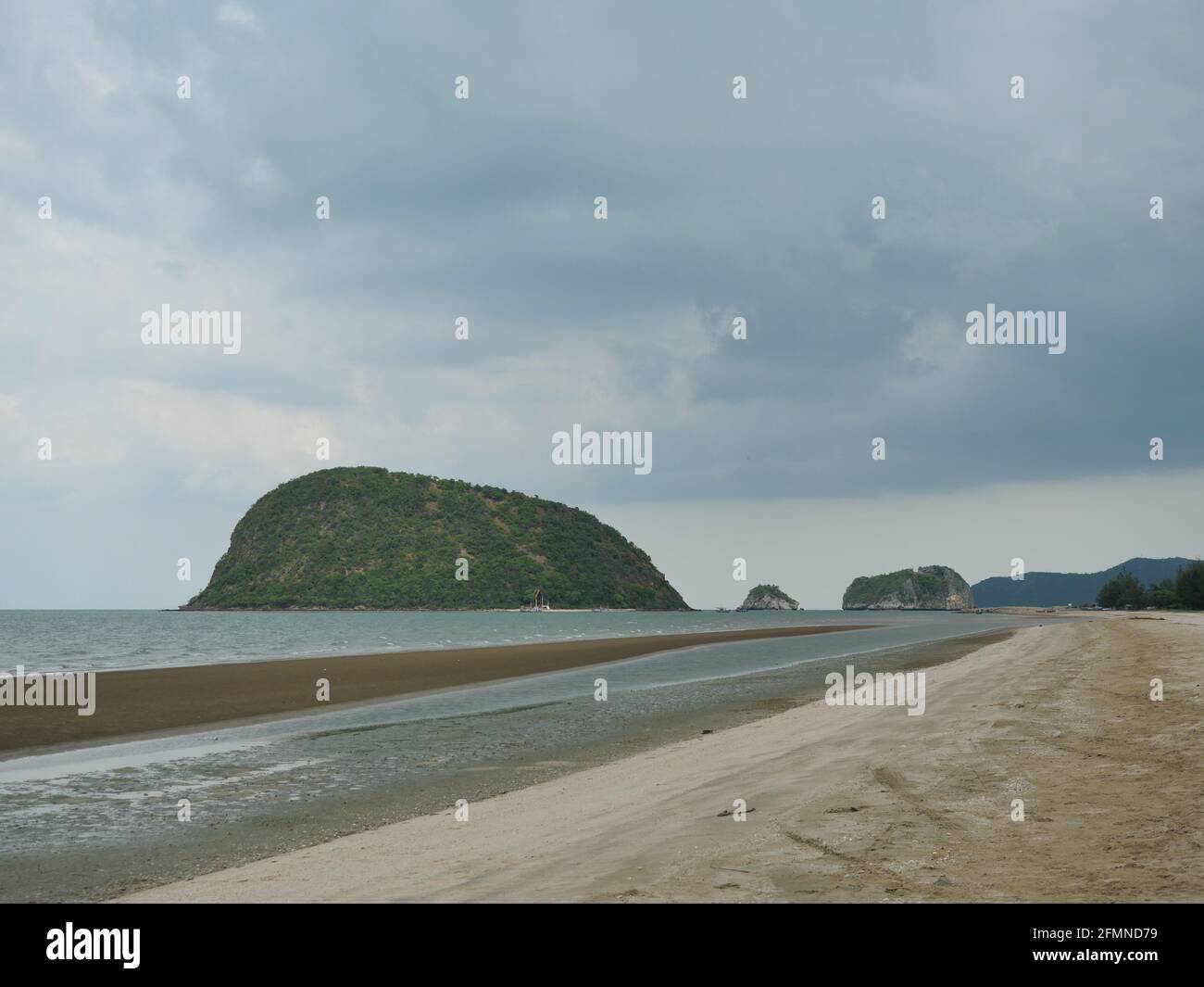 Sand and mud in water phenomenon, Fishing boat on the beach , Ocean ...