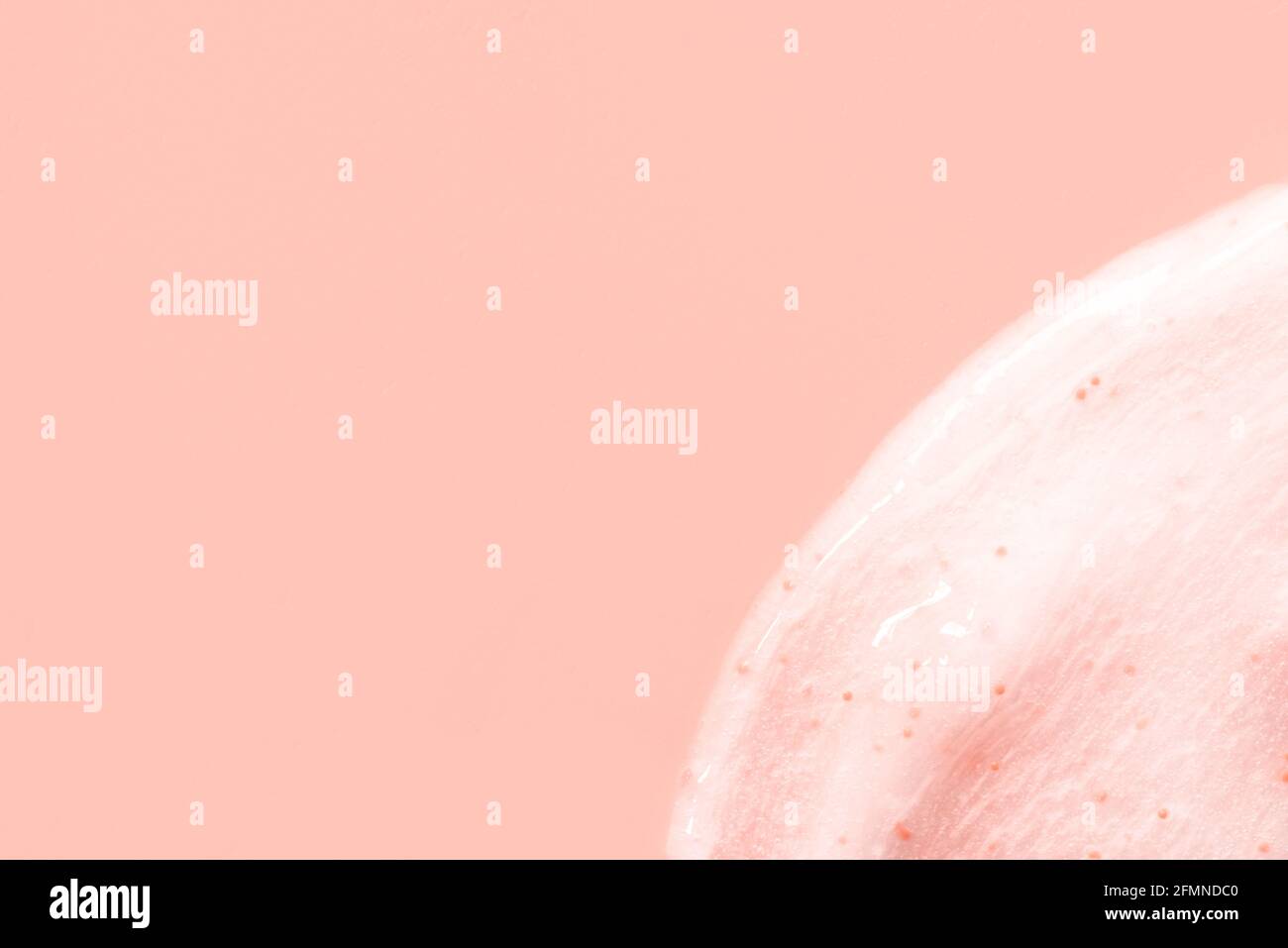 The texture of a scrub or shower gel on a pink background Stock Photo ...