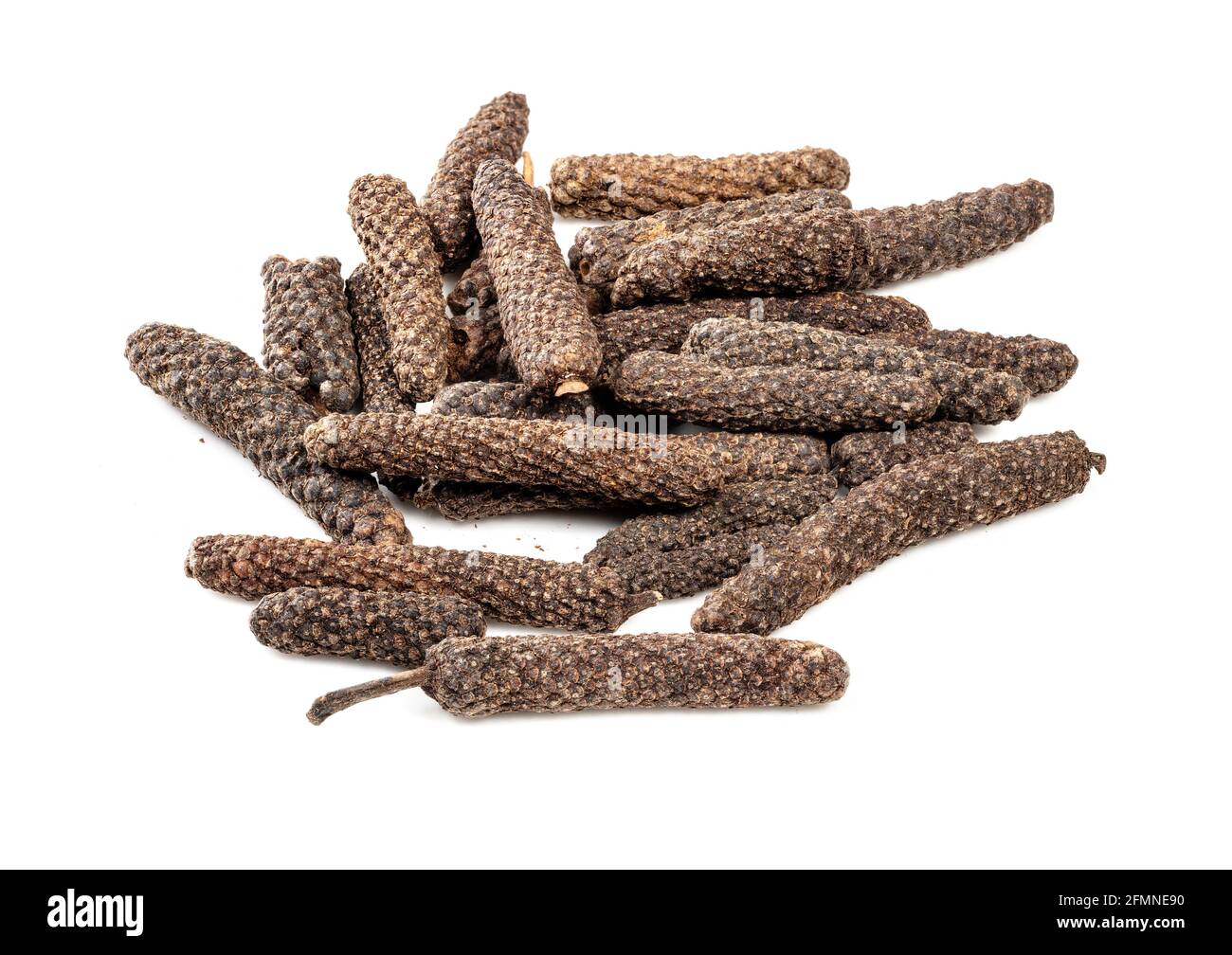 pile of java long pepper catkins closeup on white background Stock ...
