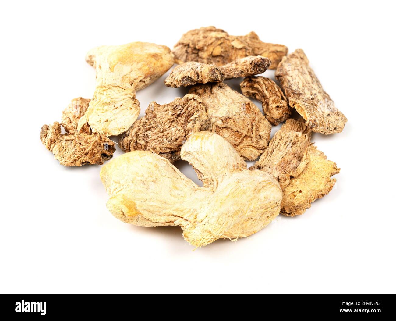 handful of dried ginger roots closeup on white background Stock Photo ...