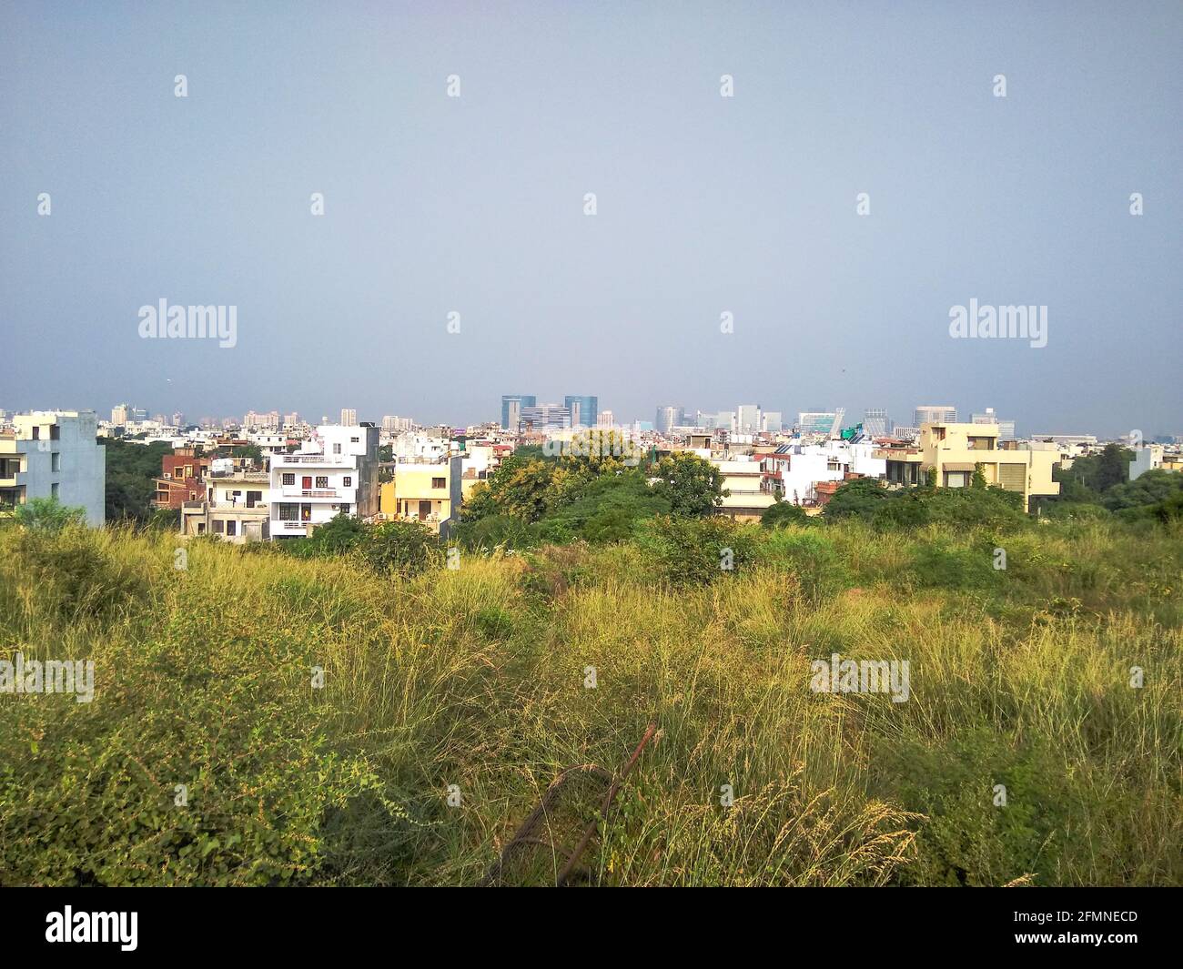 Beautiful panorama of a Gurgaon city with colorful buildings under a ...