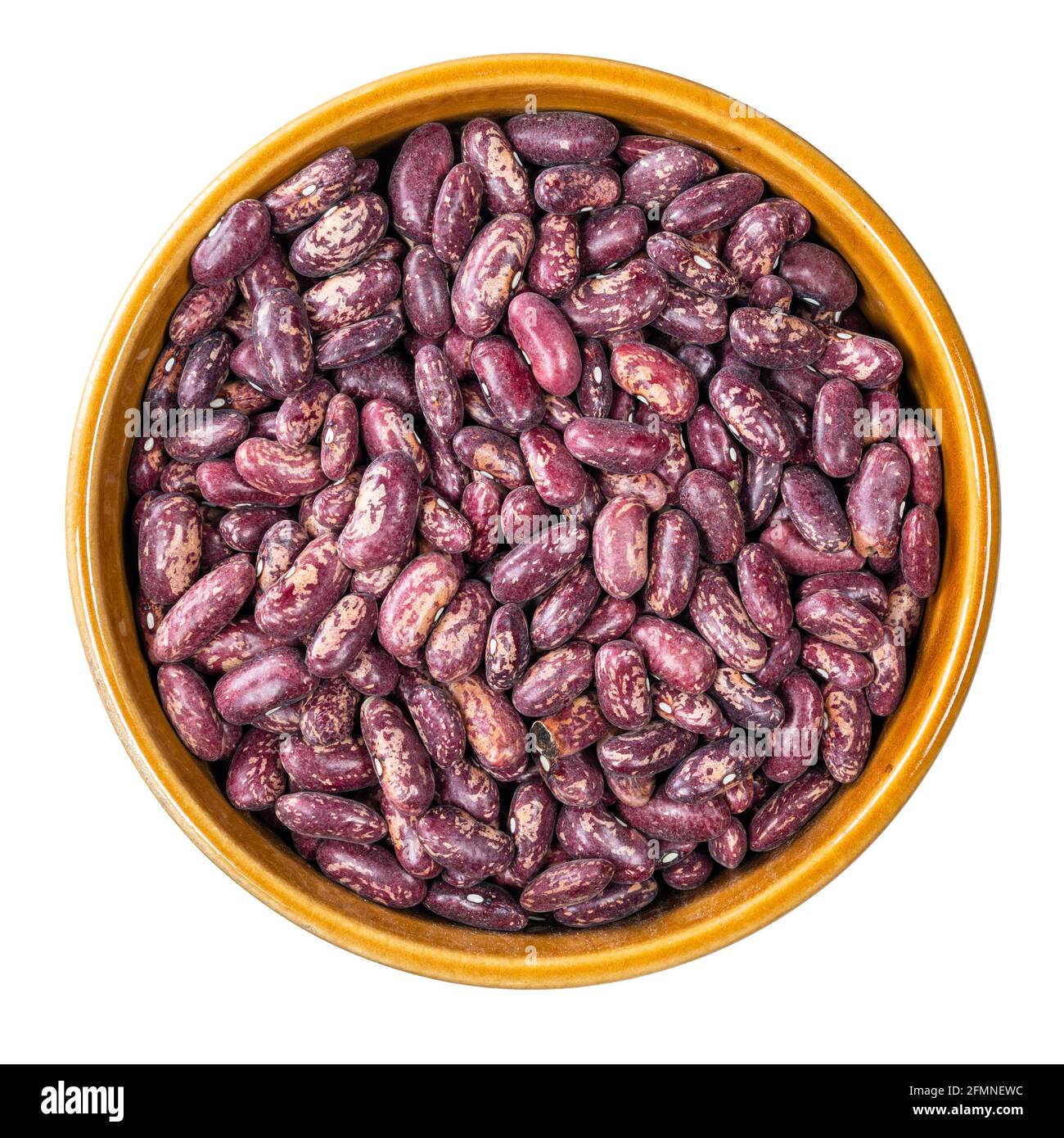 top view of red spotted pinto beans in round bowl cutout on white ...