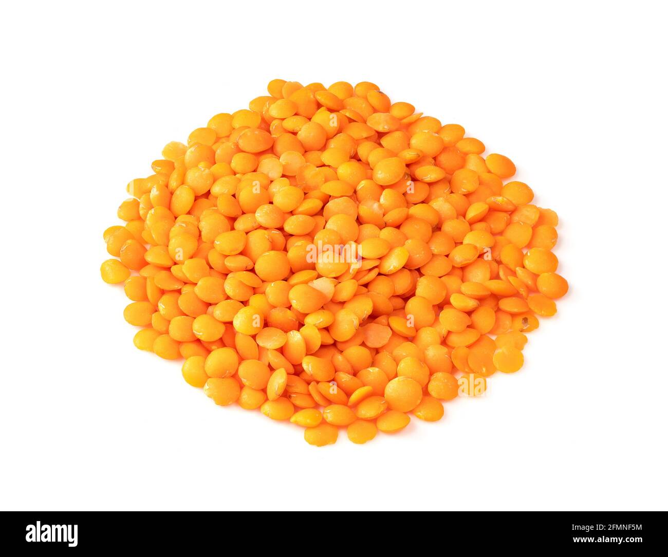 pile of whole red lentils closeup on white background Stock Photo - Alamy