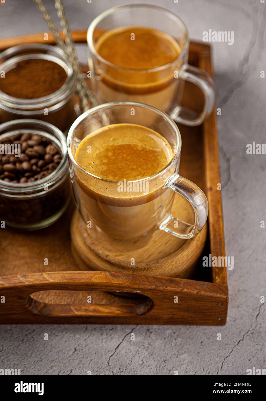 Dalgona coffee - the Korean coffee drink on wooden background. Instant ...