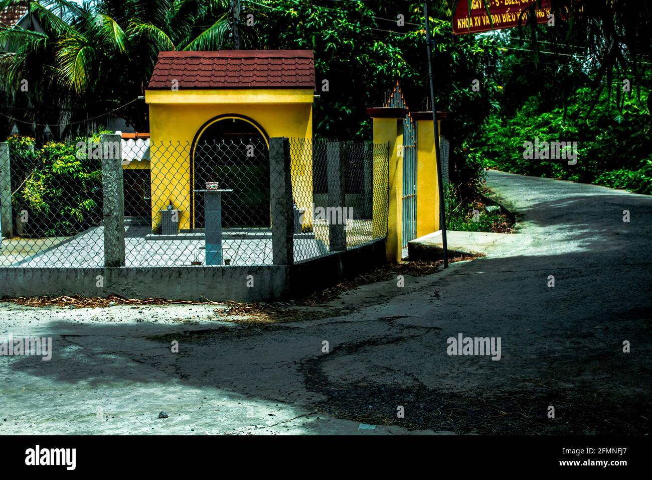 Small temple on a Village way Stock Photo - Alamy