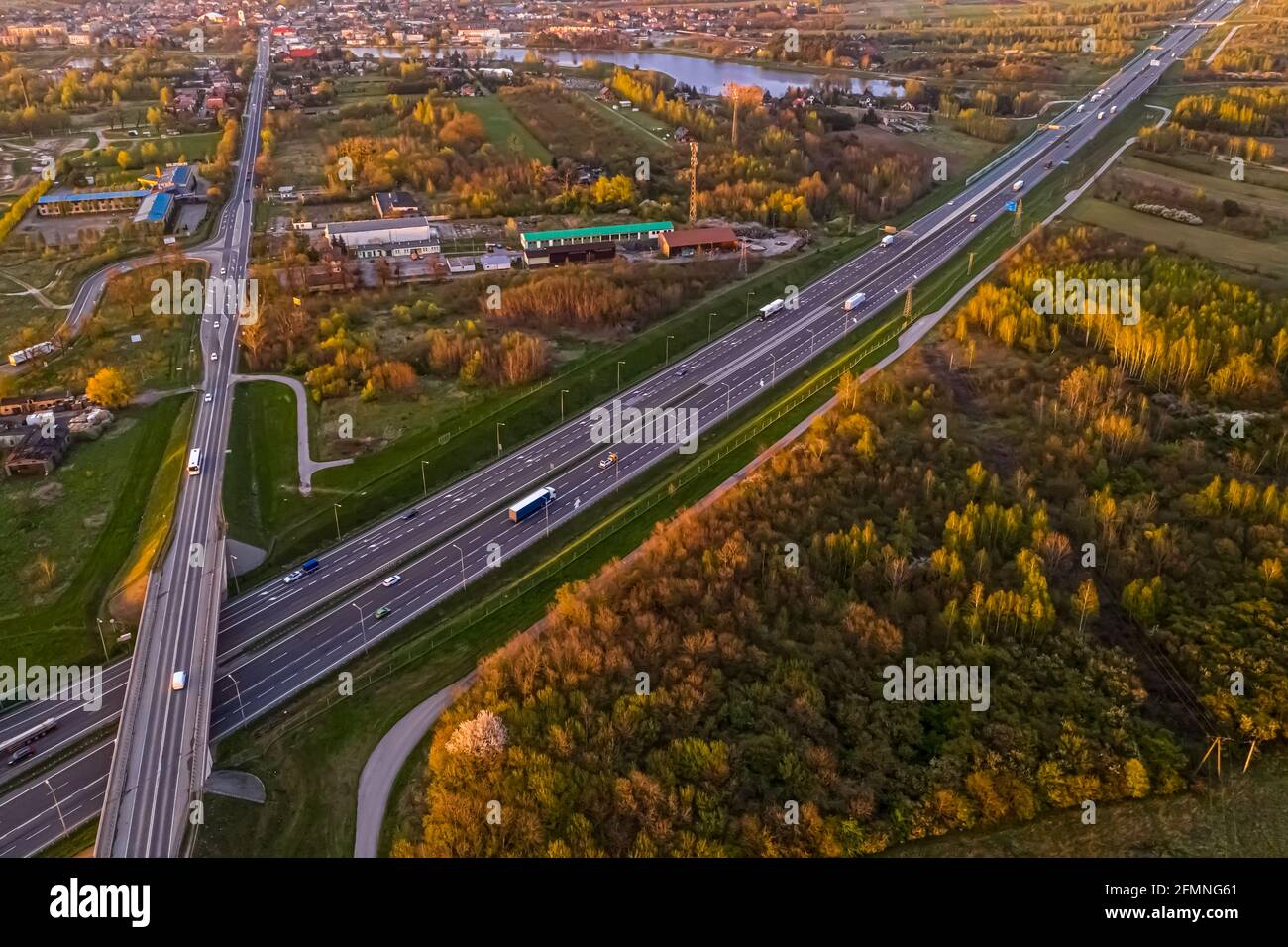 Logistics park with warehouse, loading hub and many semi trucks with ...