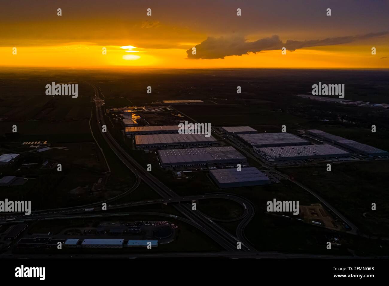 Logistics park with warehouse, loading hub and many semi trucks with ...