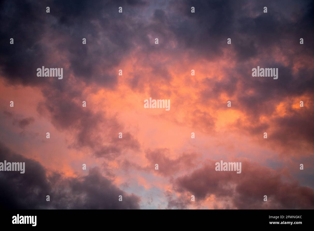 Dramatic fiery sky at sunset - contrast between warm and cold colors ...