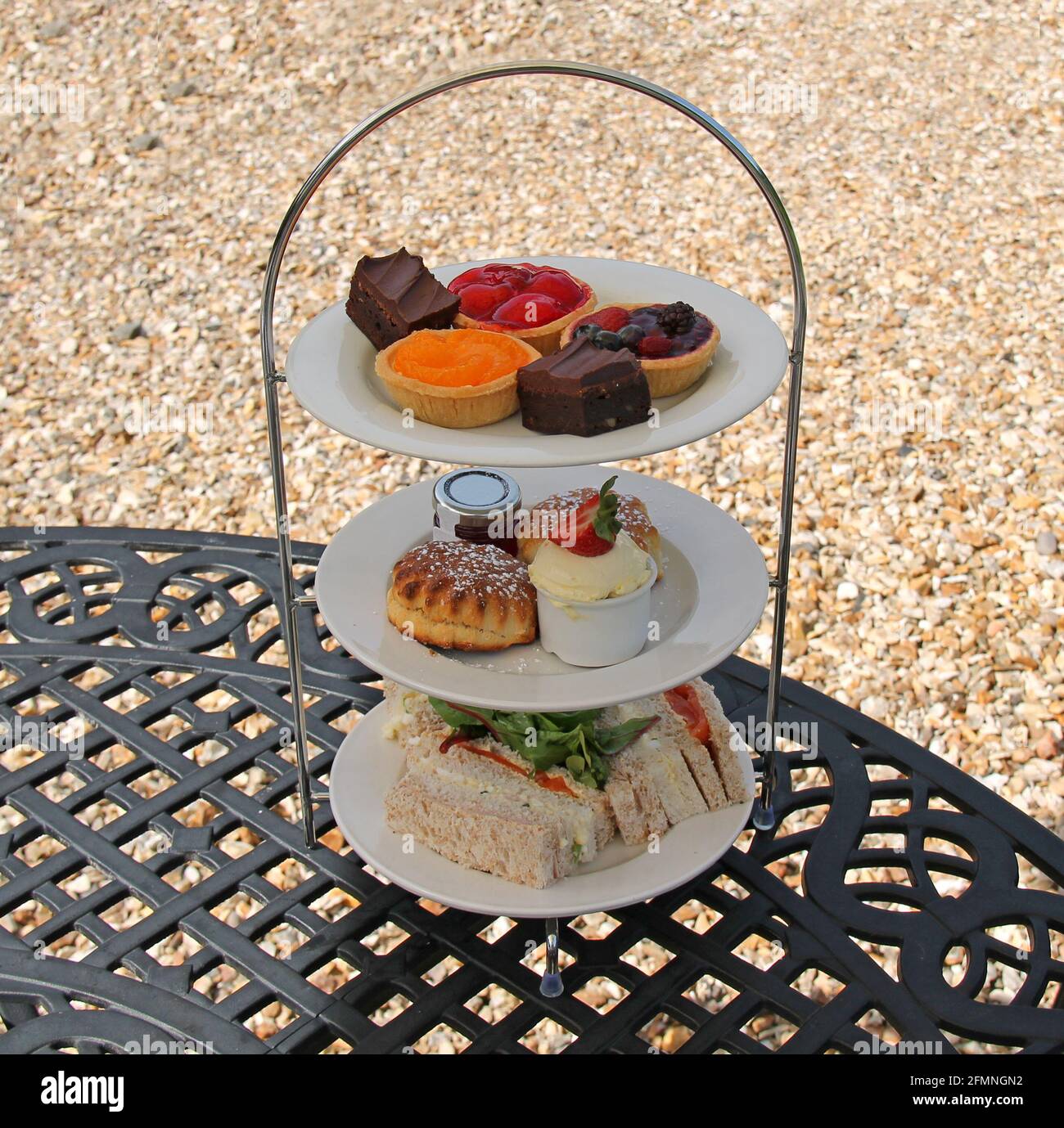 A Classic Afternoon Tea Served on a Tiered Plate Stock Photo - Alamy