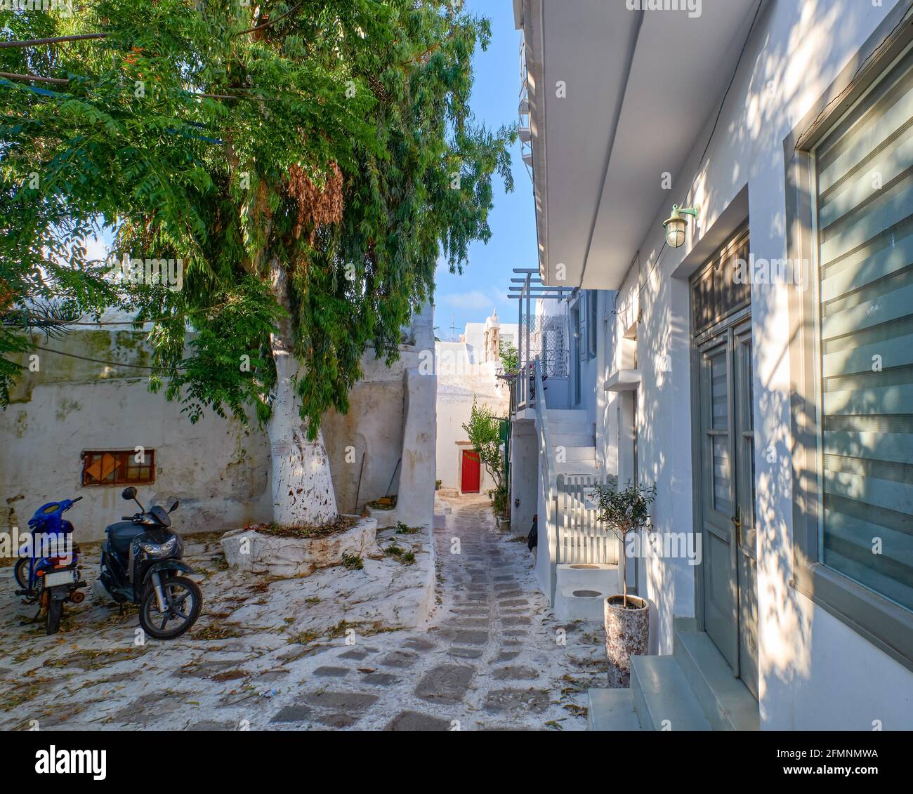 Beautiful traditional narrow cobbled streets of Greek island towns ...